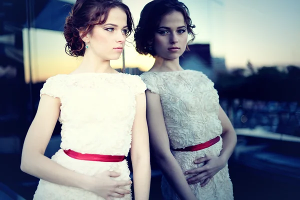 Portrait of two beautiful women Stock Photo by ©konradbak 5489559