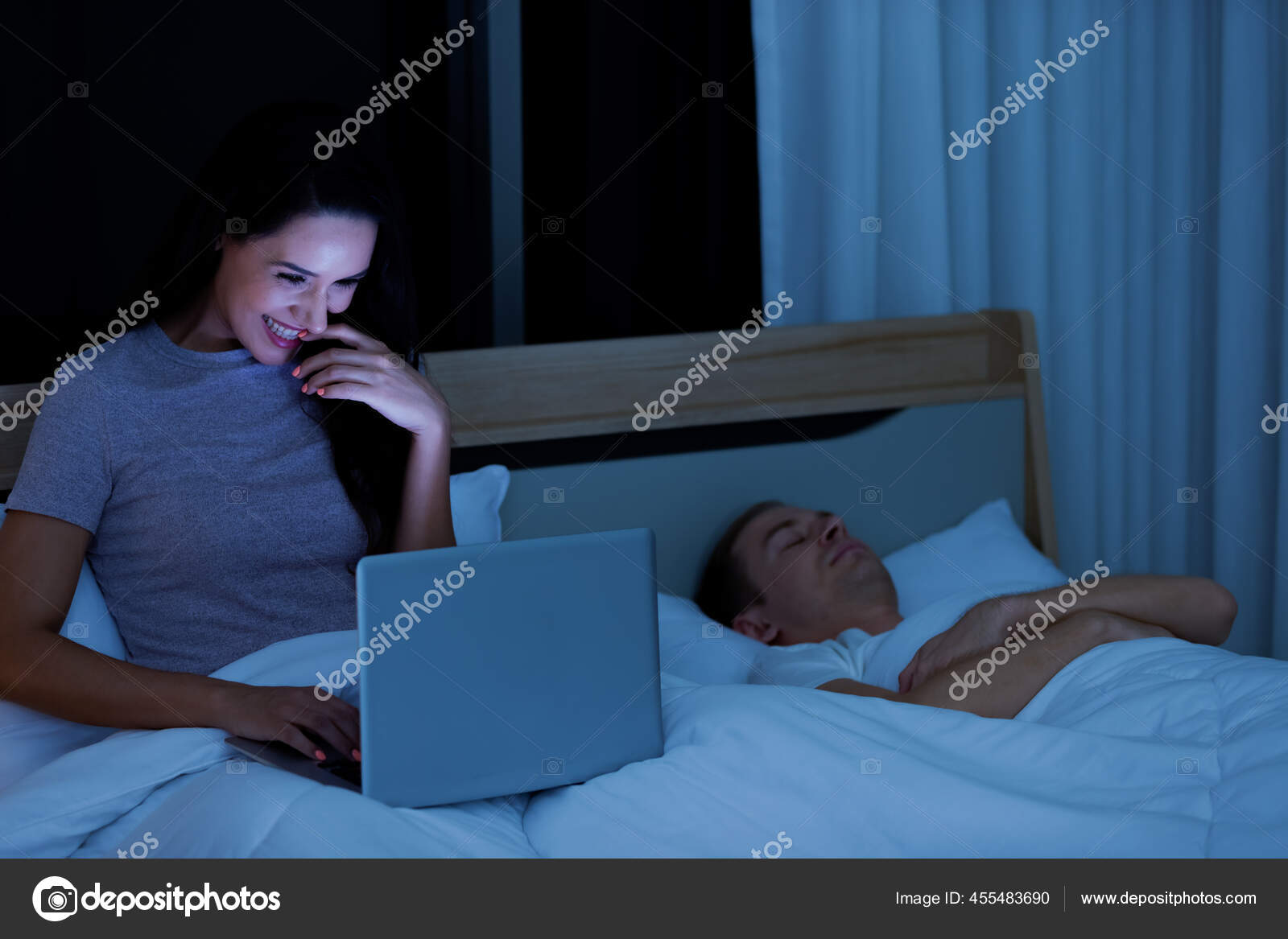 Woman Sitting Bed Night Using Laptop Computer While Husband Sleeping ...