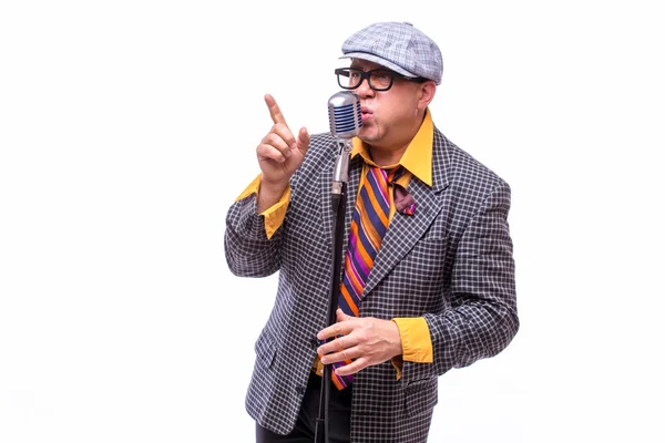 Old male showman singer artist with music instruments on white Stock ...