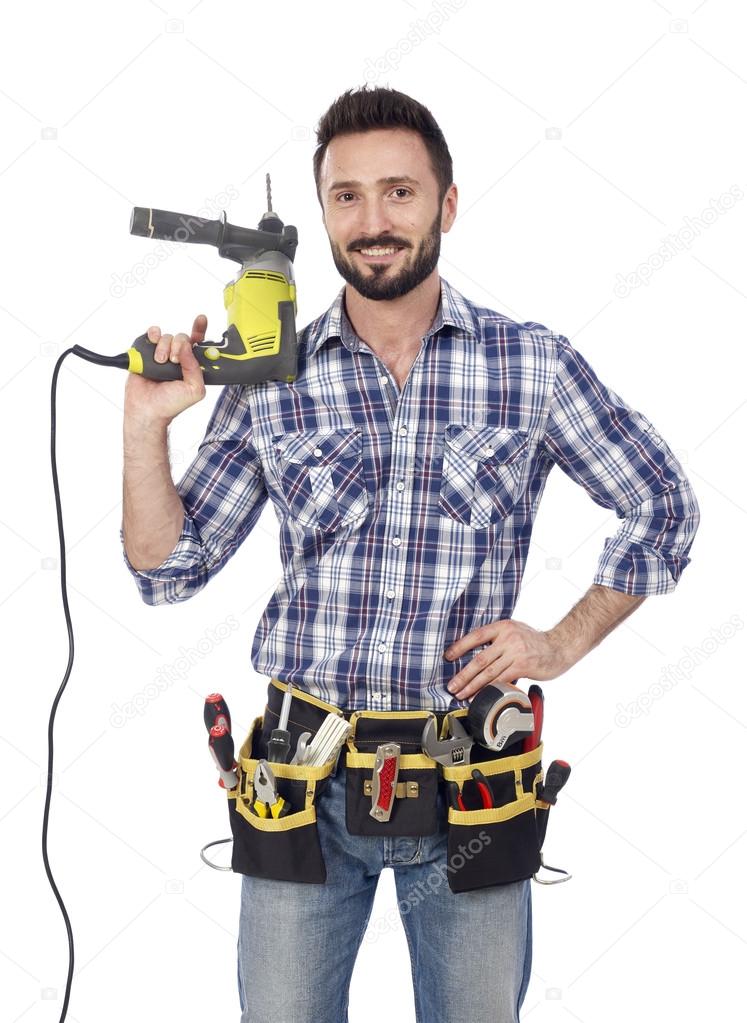 Handyman with drill Stock Photo by ©Goir 104339020