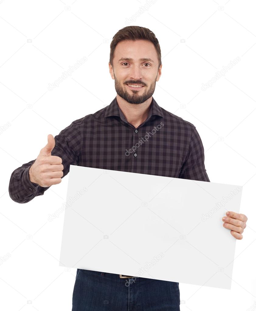Man holding a blank sign Stock Photo by ©Goir 97976756