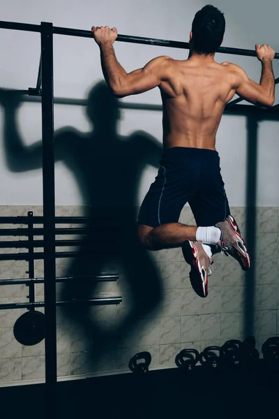 Muscular Men Doing Pull Ups as part of Crossfit Training. - Stock Image ...