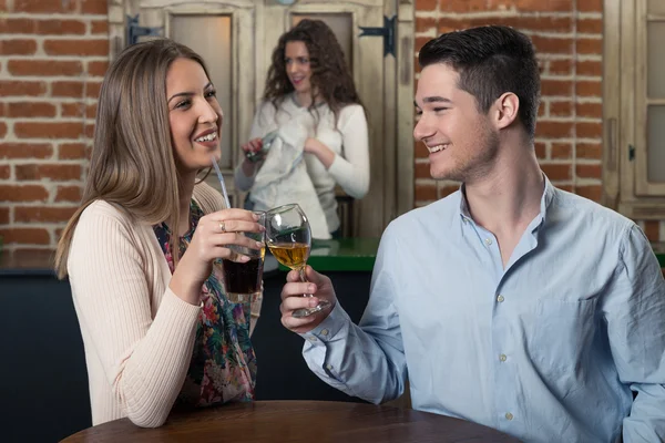 Couple Flirting at a Bar Stock Photo by ©SerbBgd 91077796