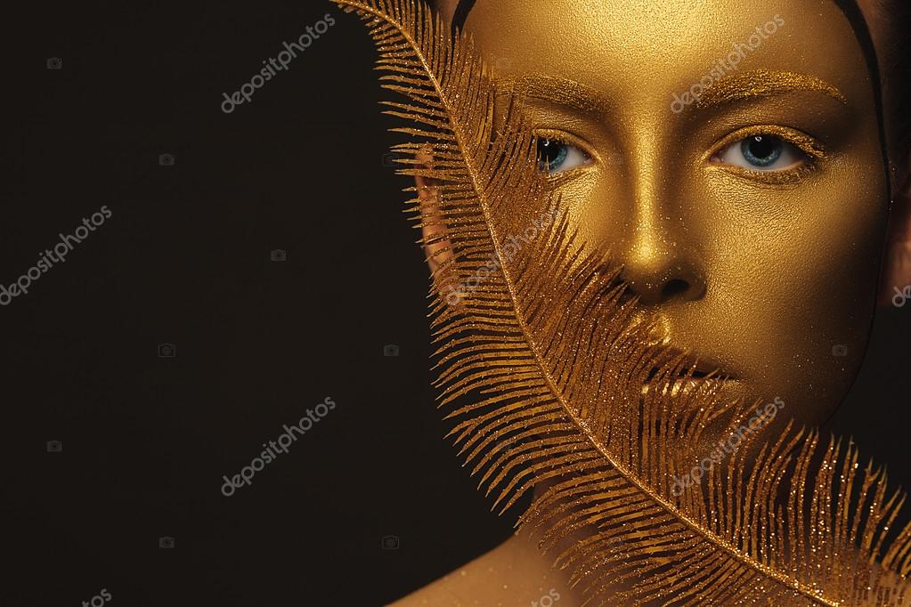 Golden Face. Woman with Luxury Gold Make-up. Stock Photo by ©y ...