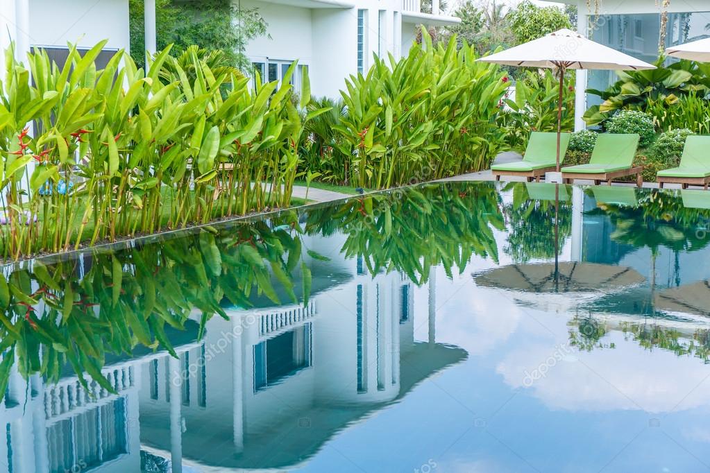 Pool area with plants ⬇ Stock Photo, Image by © gorov108 #123241952
