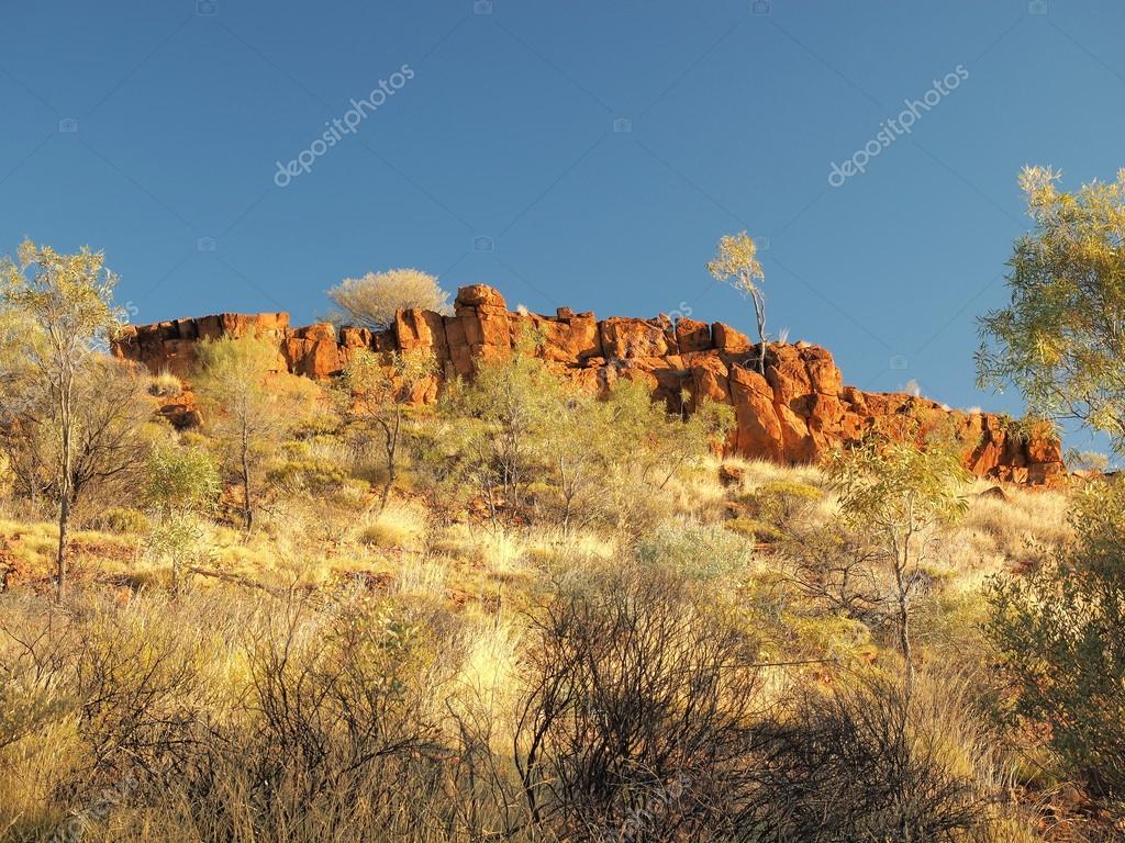 Glowing outback rock formation of the MacDonn Stock Photo by ©Stringer ...