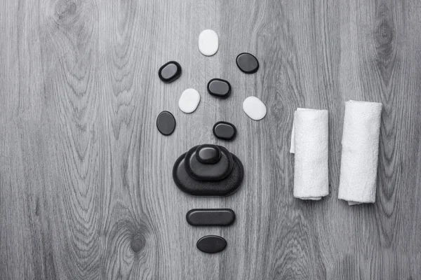 Wax candles and massage stones, top view — Stock Photo © tan4ikk #182564558