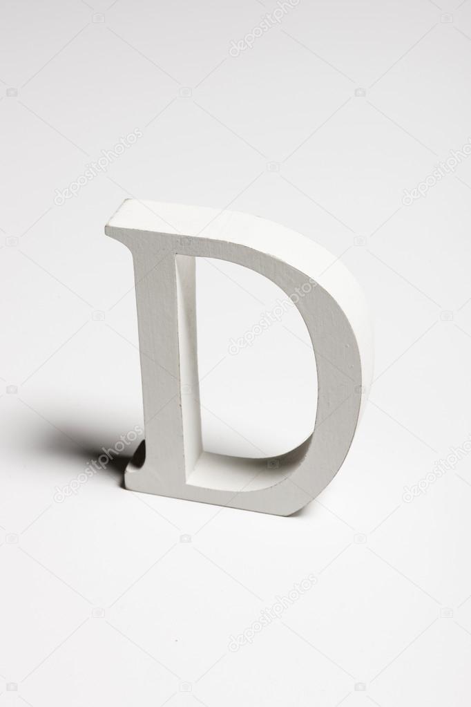 White wood craft for alphabet 'd' isolated white Stock Photo by ...