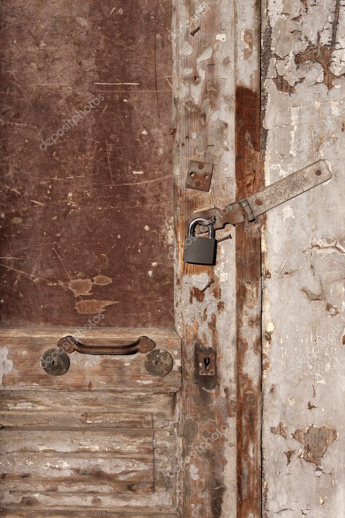 Old rusty wooden door Stock Photo by ©Koraysa 95132626