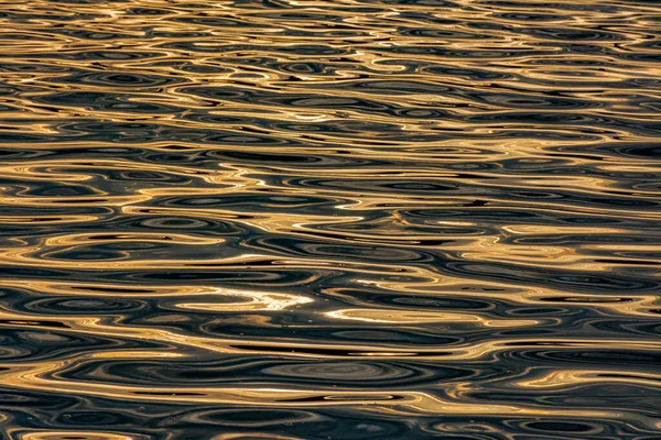 Reflections of sunlight in the water of a reservoir. - Stock Image ...