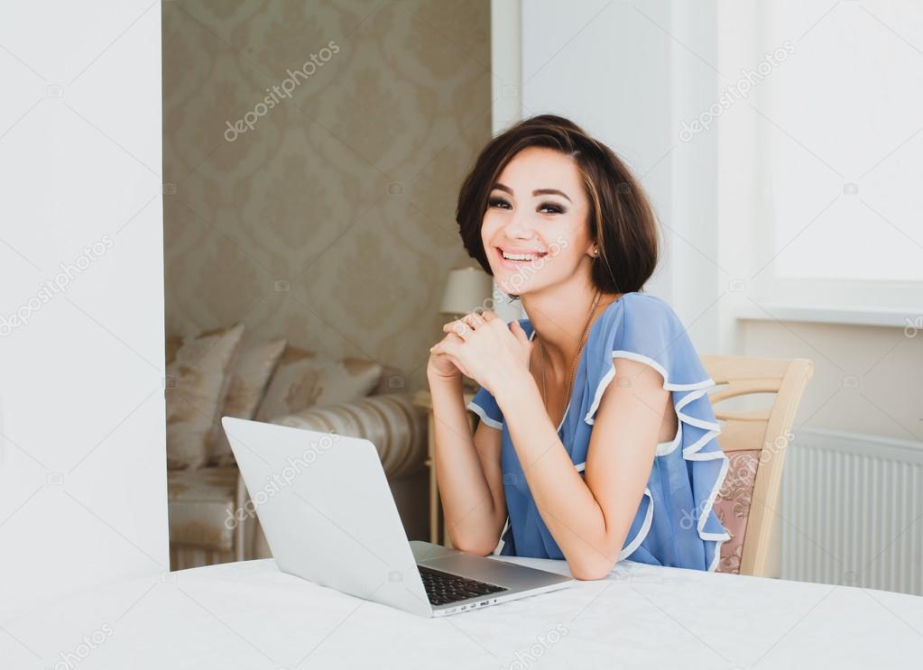 Young lady working at home — Stock Photo © sergey_causelove #96924882
