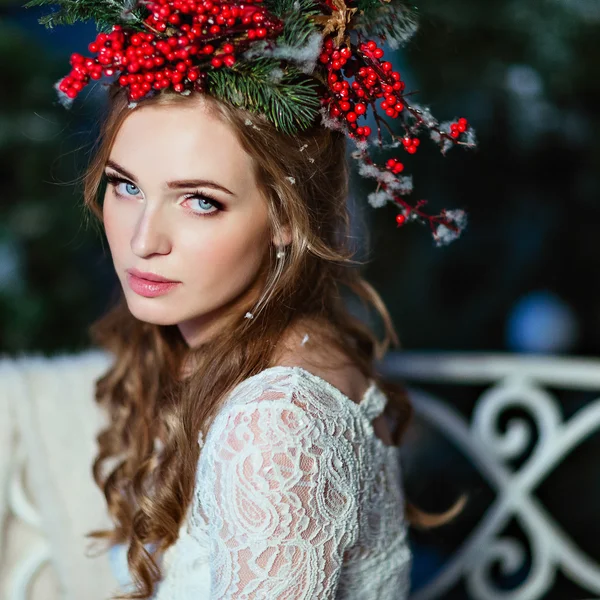 Portrait Of Red Haired Girl With A Wreath Of Red Berries On The Head