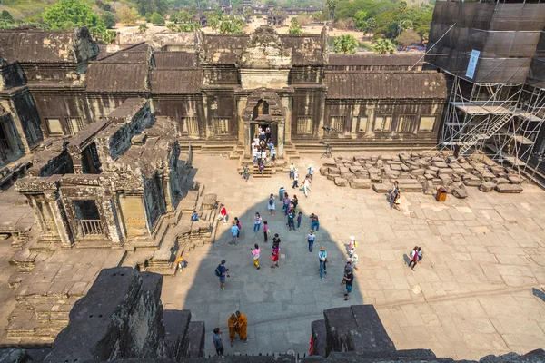 Group of people walking inside Angkor Wat - Stock Image - Everypixel