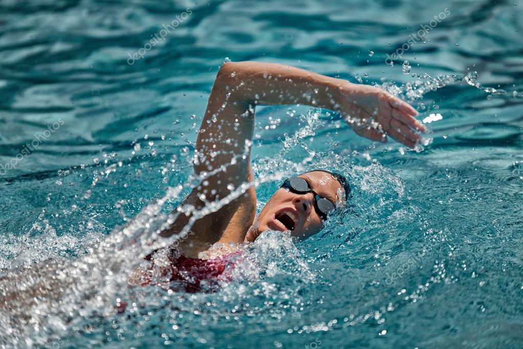 Swimmer in action — Stock Photo © microgen #103322296
