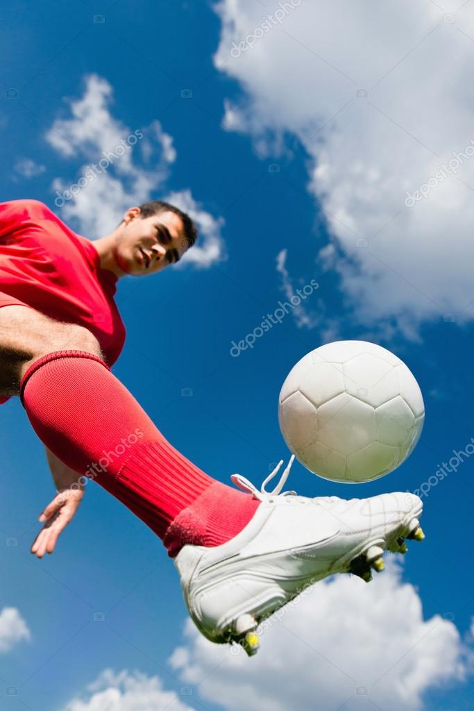 Soccer player controlling the ball — Stock Photo © microgen #110965874