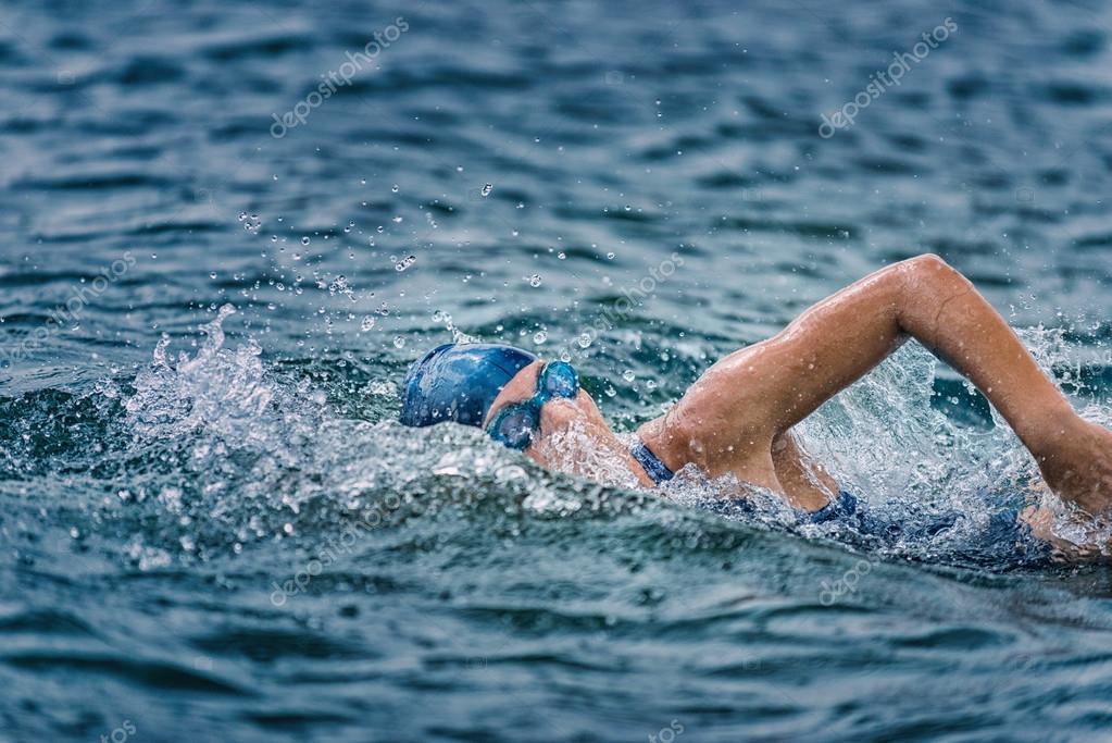 Female athlete swimming long distance — Stock Photo © microgen #111616462
