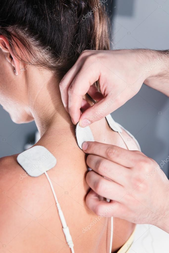 TENS Unit treatment Stock Photo by ©microgen 115174010