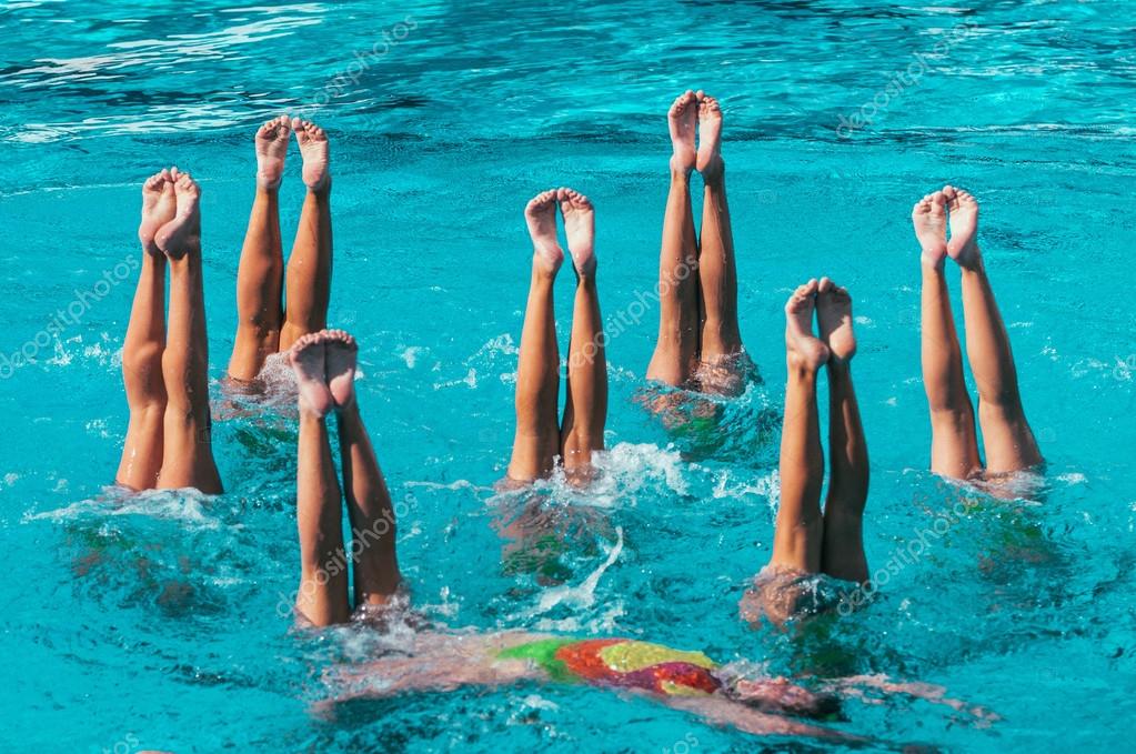Synchronized swimmers performance with legs Stock Photo by ©microgen ... Synchronized swimmers performance with legs Stock Photo by ©microgen ...