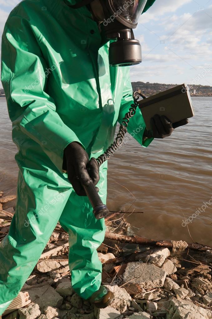 Male Environmentalist with geiger counter — Stock Photo © microgen ...