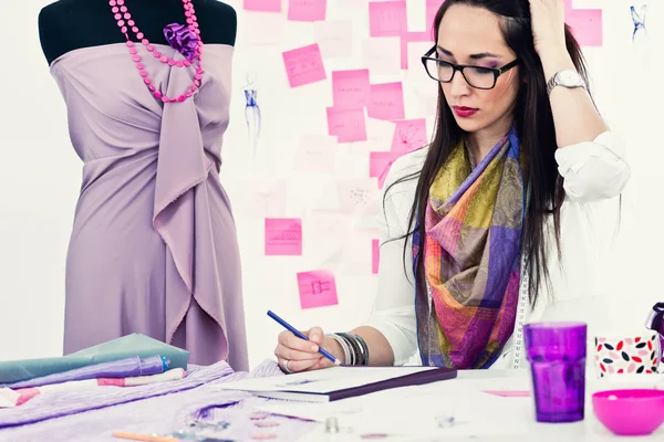 Fashion designer working Stock Photo by ©microgen 115995112