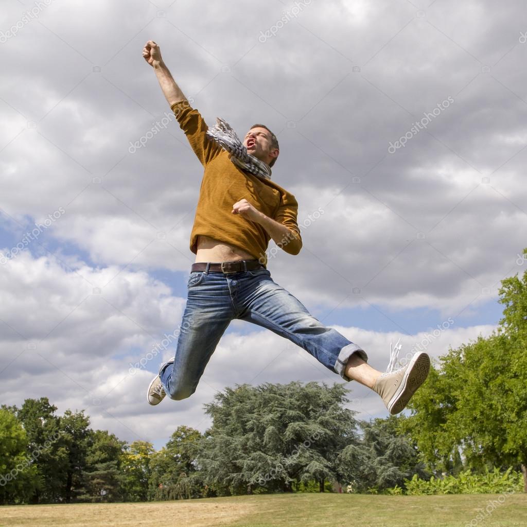 Happy Man Jumping Nature