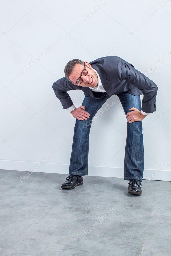 Perplexed middle aged businessman with eyeglasses having eyesight ...