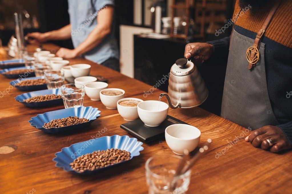 Professional baristas coffee tasting Stock Photo by ©mavoimages 101558932