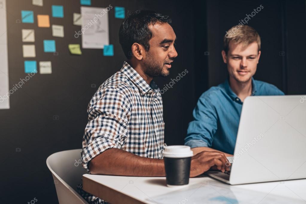 Designers collaborating on project together Stock Photo by ©mavoimages ...