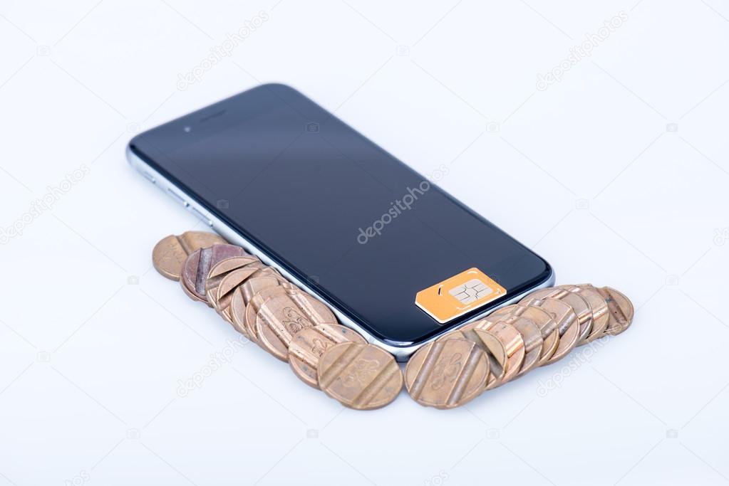 New generation phone with old telephone tokens, and SIM — Stock Photo ...