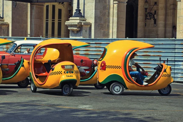CUBA, HAVANA-JUNE 26, 2015: Cocotaxi is an auto rickshaw-type taxi ...