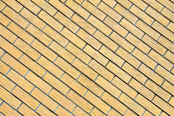 Vintage Orange brick wall, background, diagonal position, stone texture ...