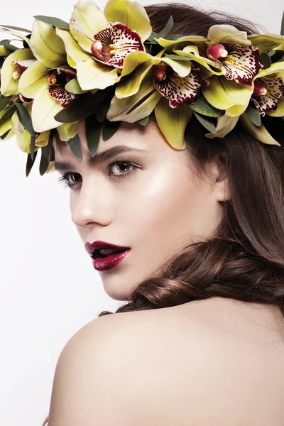 Model With Orchid Flowers wreath - Stock Image - Everypixel