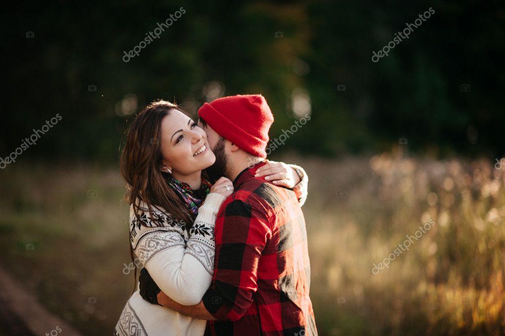 Lovers hugging in nature — Stock Photo © minnebaevpro #102315744