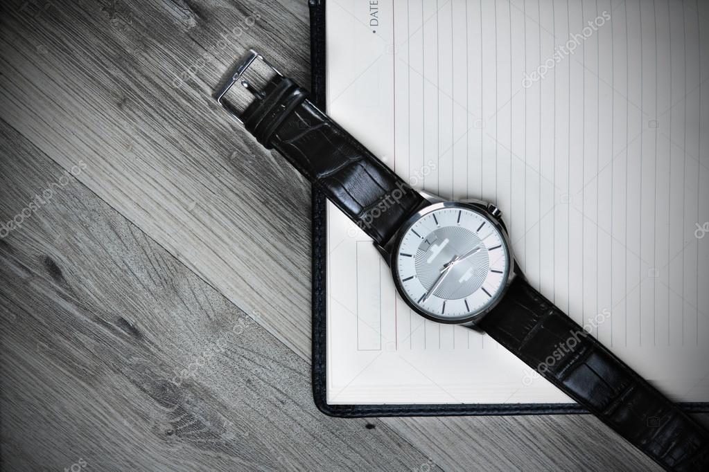 Notepad and watches on the texture — Stock Photo © simplesseller.gmail ...