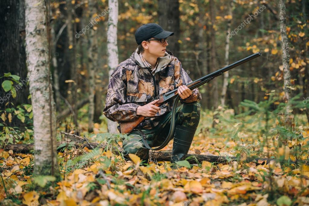 Man hunter in forest Stock Photo by ©Scharfsinn 120077234