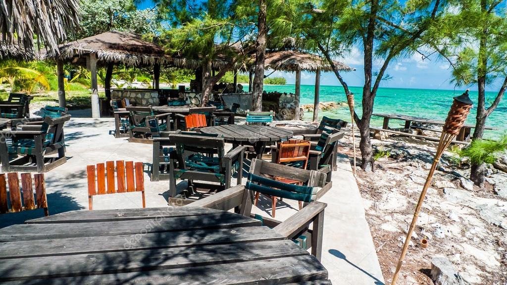 Dining tables in the Bahamas — Stock Photo © jason.troutnut.com #99621460