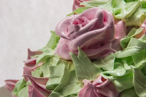 Sponge cake decorated with cream flowers - Stock Image - Everypixel