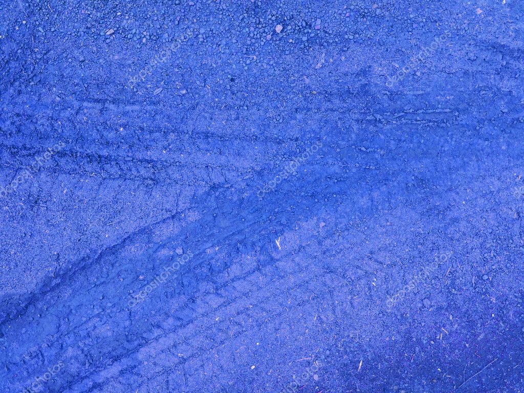Blue Tire tracks on the blue road gravel stone background Stock Photo ...