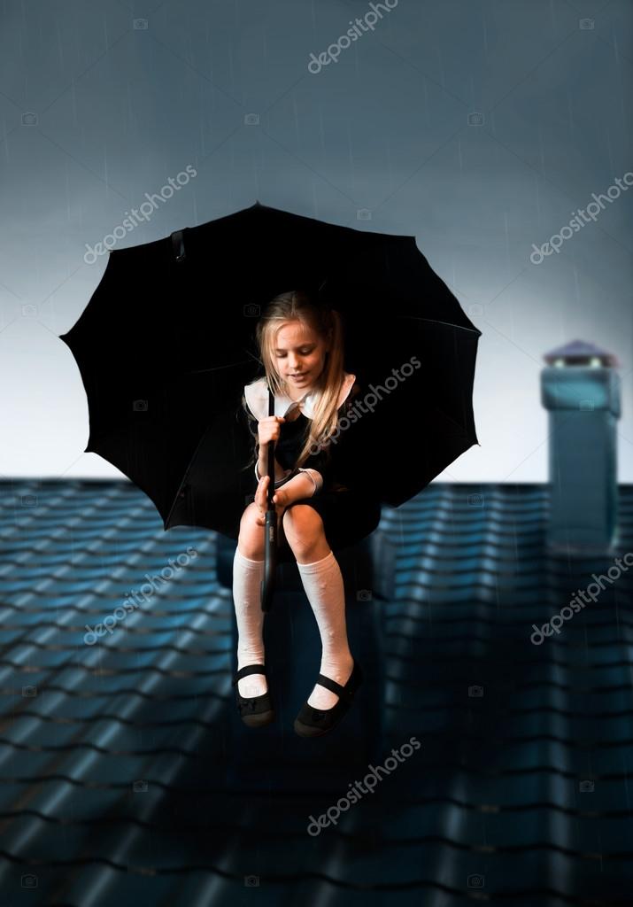 Cute little girl sitting on the roof with an umbrella — Stock Photo © UGCannel #114067560
