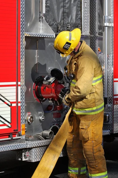 A firefighter in full uniform - Stock Image - Everypixel