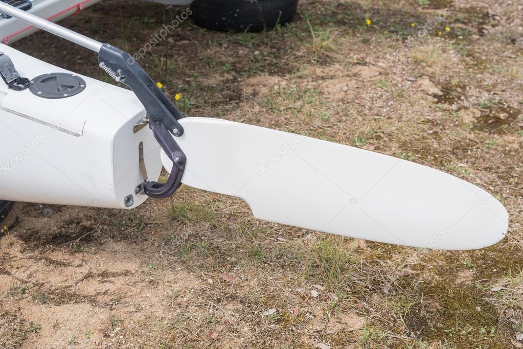 White Catamaran boat rudder ashore on sand — Stock Photo © sbonaime ...