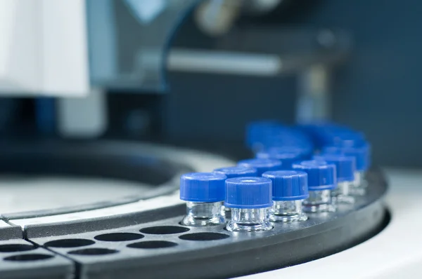 Sample vials in line waiting for analysis - Stock Image - Everypixel