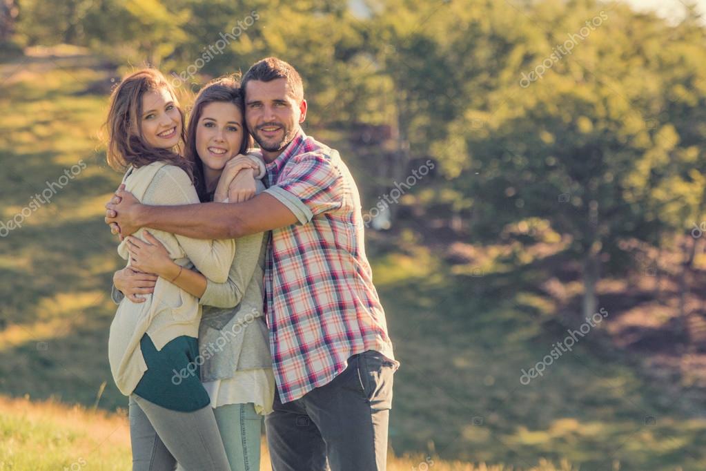 Three Friends Hugging