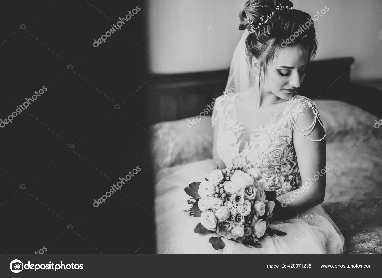 Beautiful bride wearing fashion wedding dress with feathers with luxury ...
