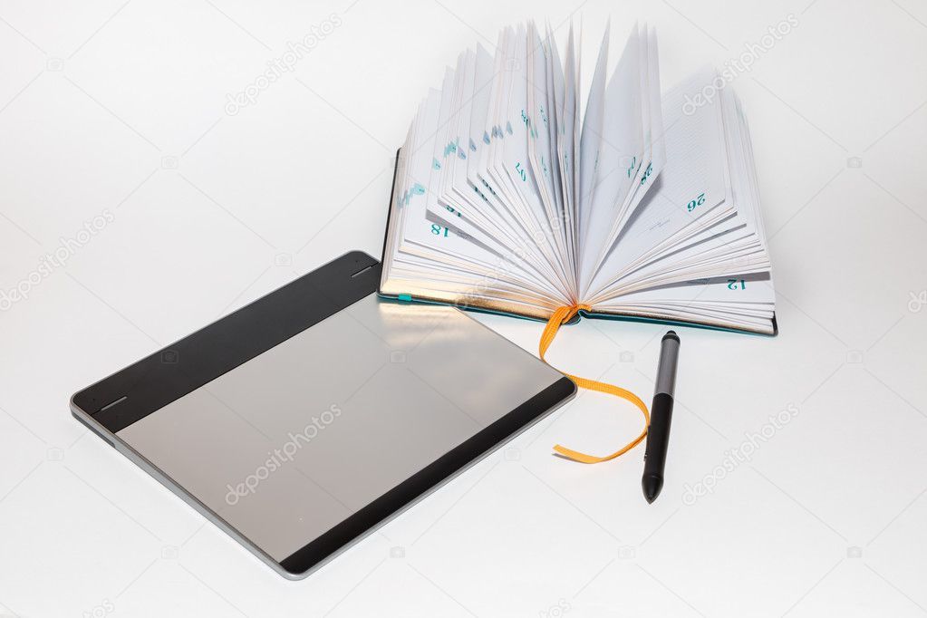 The graphic tablet with pen and notebook — Stock Photo © lisomiibgurina ...