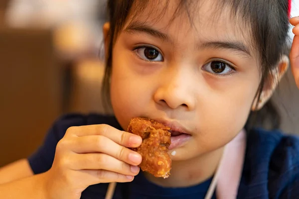 Kid eating chicken Stock Photos, Royalty Free Kid eating chicken Images ...