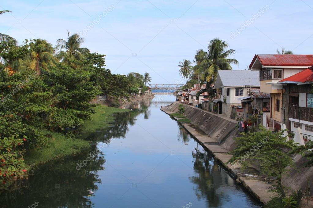 River view with trees and houses — Stock Photo © Elya.Q #100020600