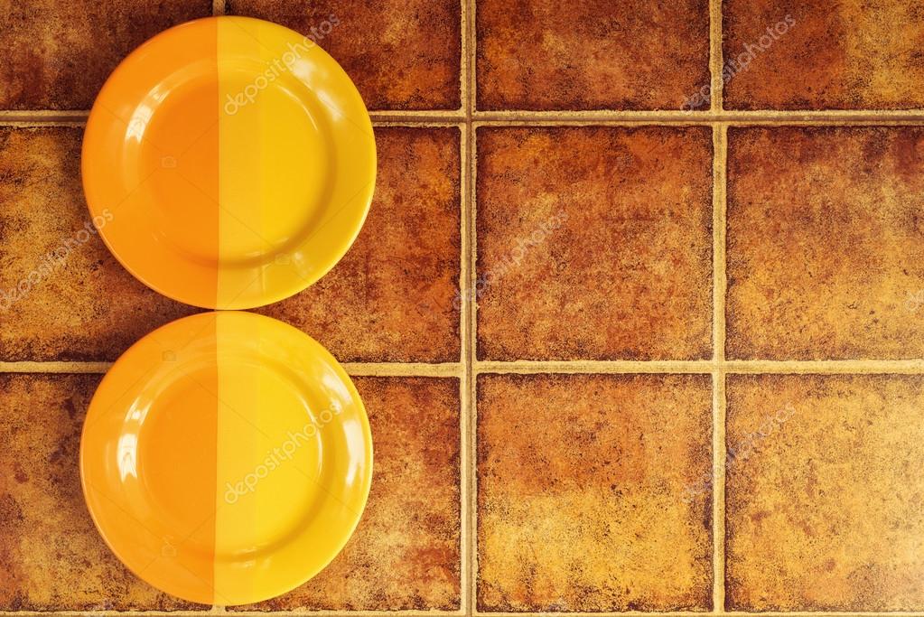 Two multi-colored plates Stock Photo by ©tuutikka 113534688