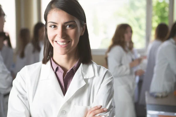 Scientific male researcher holding folder of chemical experiment ...