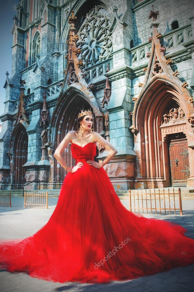 Beautiful girl in long red dress and in royal — Stock Photo © Kateryna ...